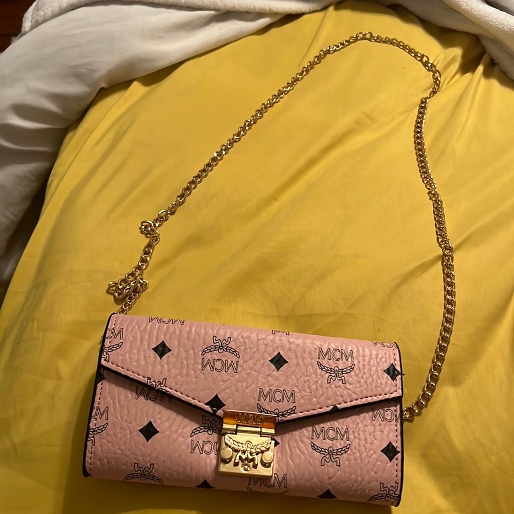 What I’m Selling Is A Pink Mcm Crossbody Purse. - Gem